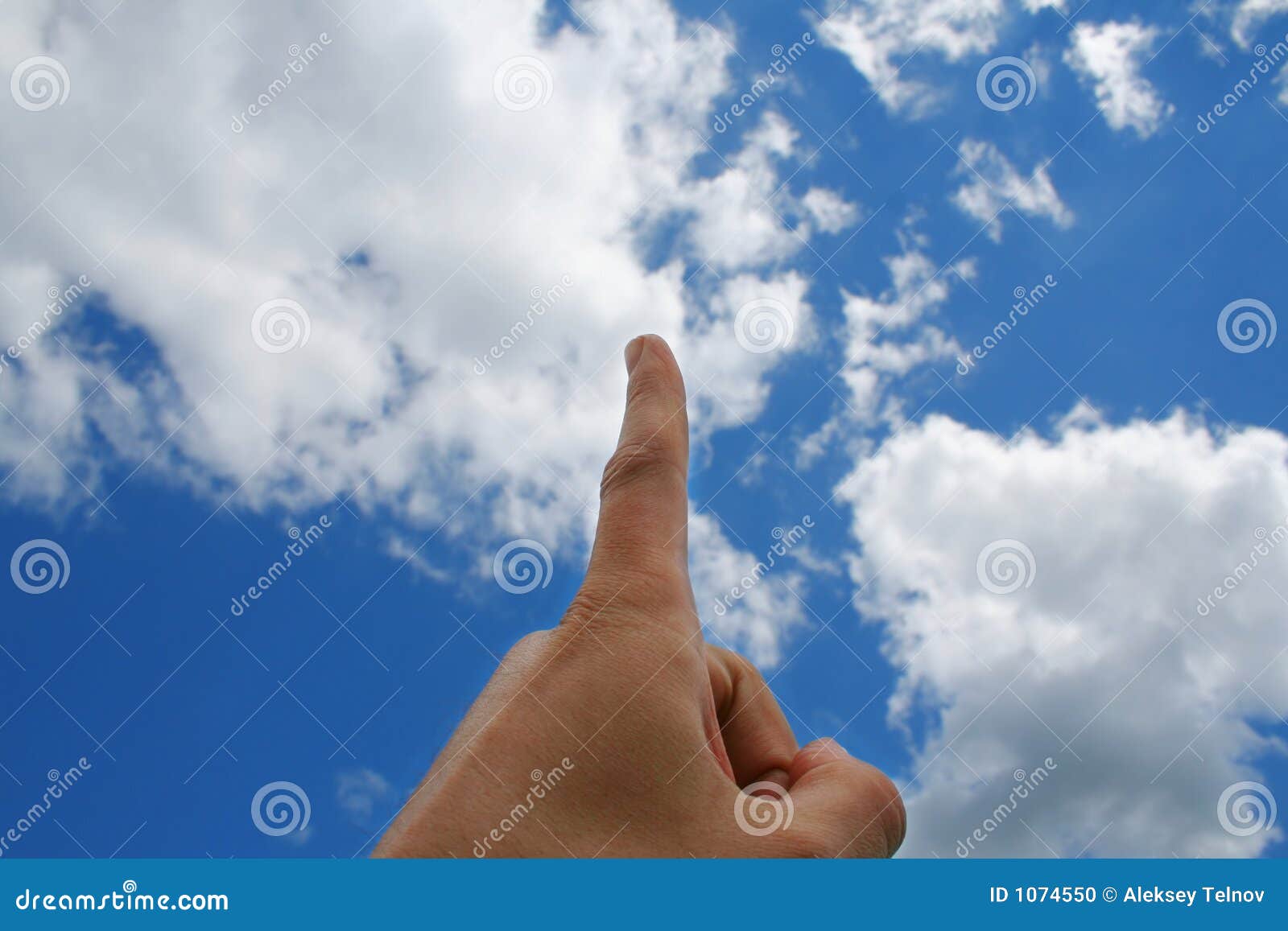 Finger in the sky stock photo. Image of clouds, close - 1074550