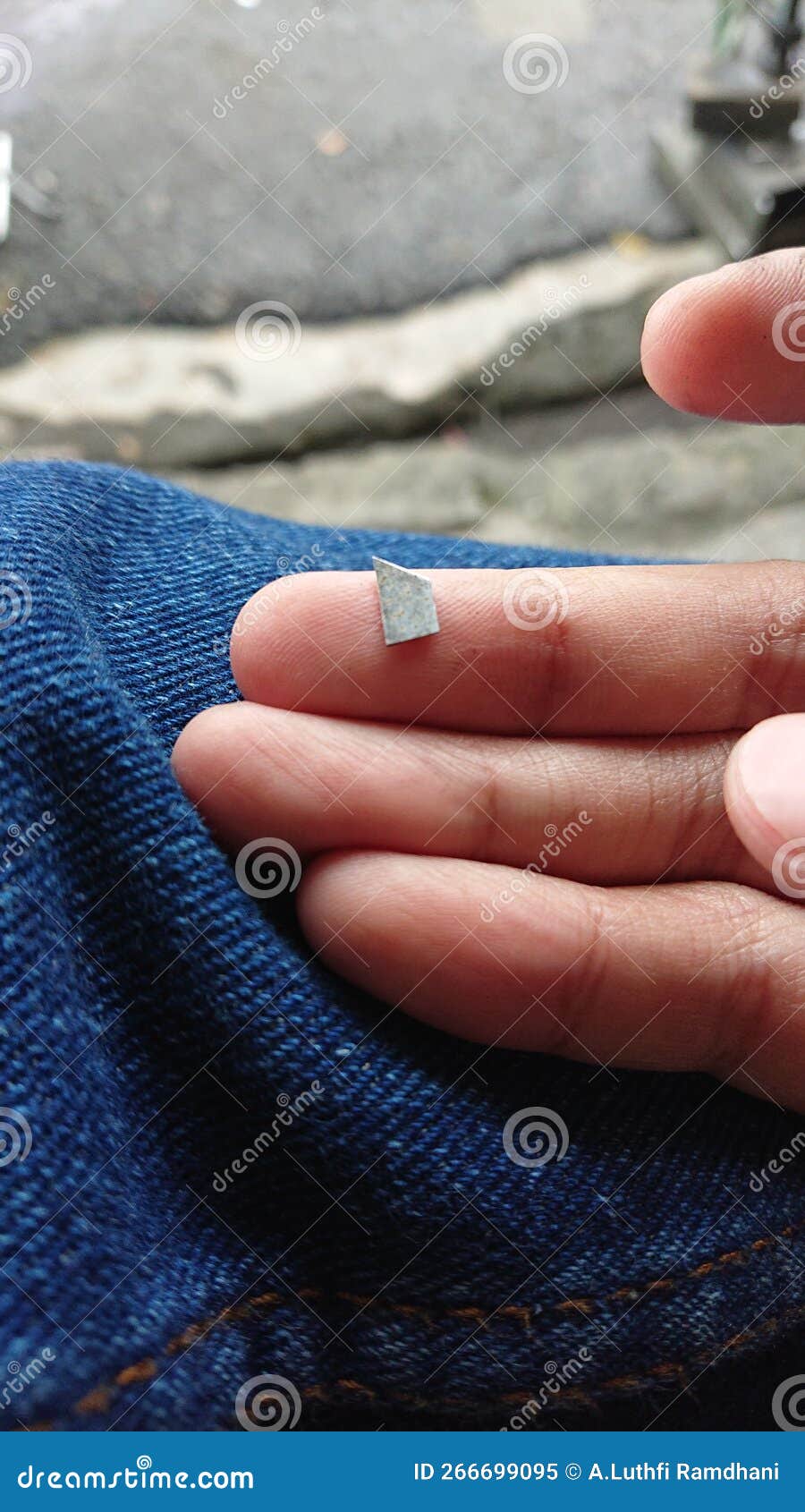 A Finger and a Splinter of Iron Petal Stock Image - Image of skin ...