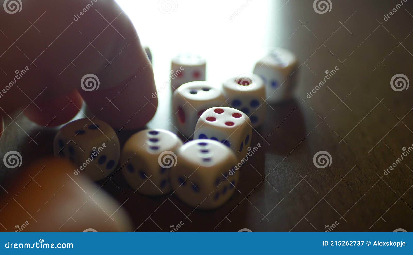 Finger Tapping on Table with Dice on Shallow Depth of Field Stock Image ...