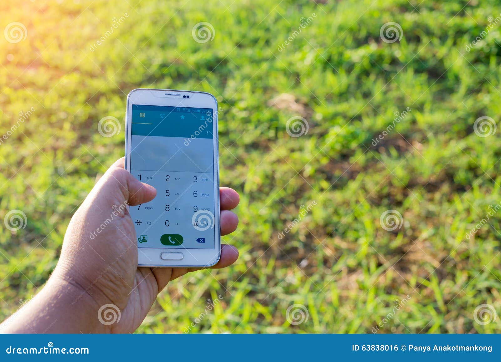 Finger Touch Number on Smartphone To Make a Call, in the Moning Stock ...