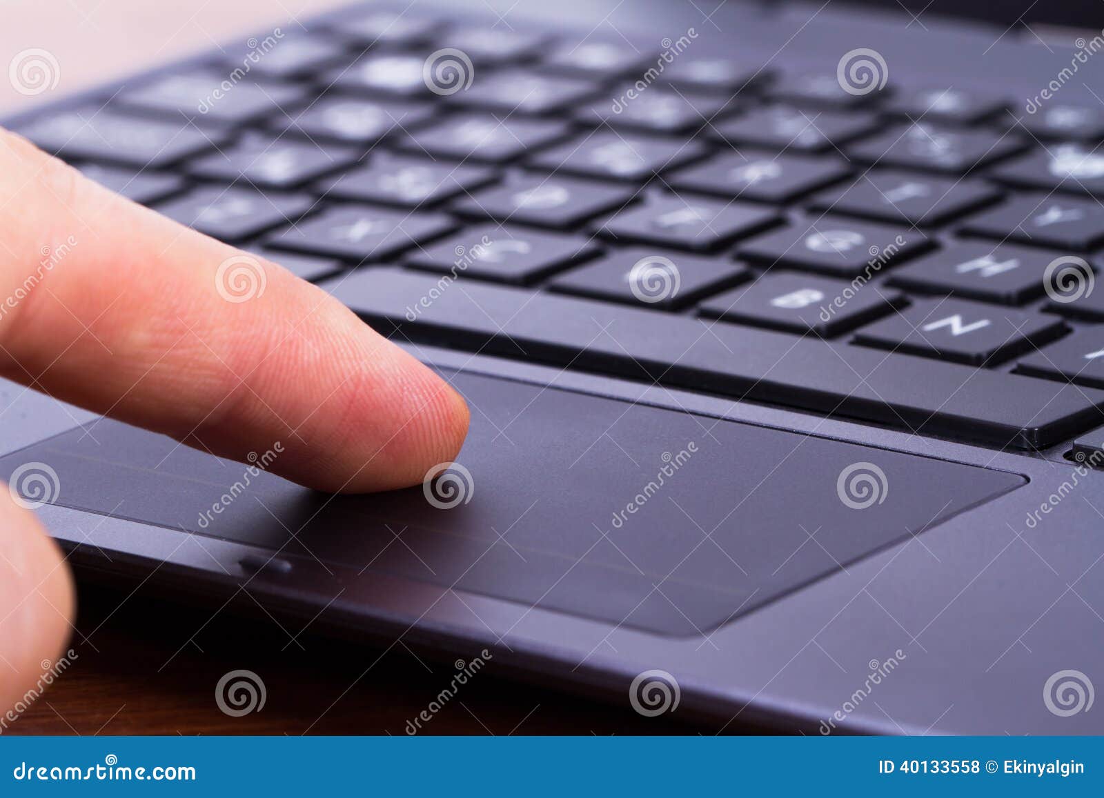 Finger on Touch Pad stock photo. Image of keypad, concept - 40133558