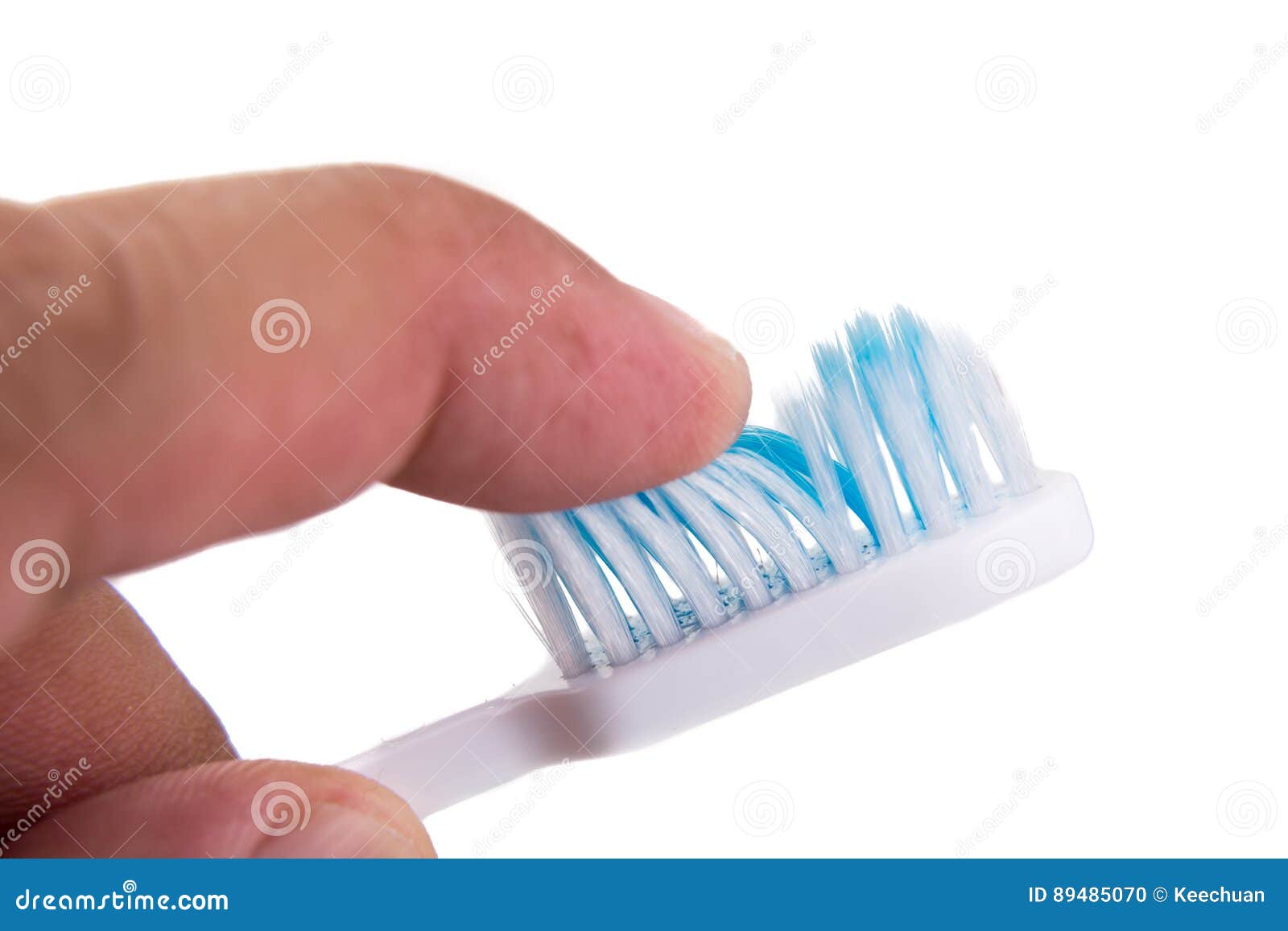 Finger Touching Soft and Slim Tapered Toothbrush Bristle Stock Photo ...