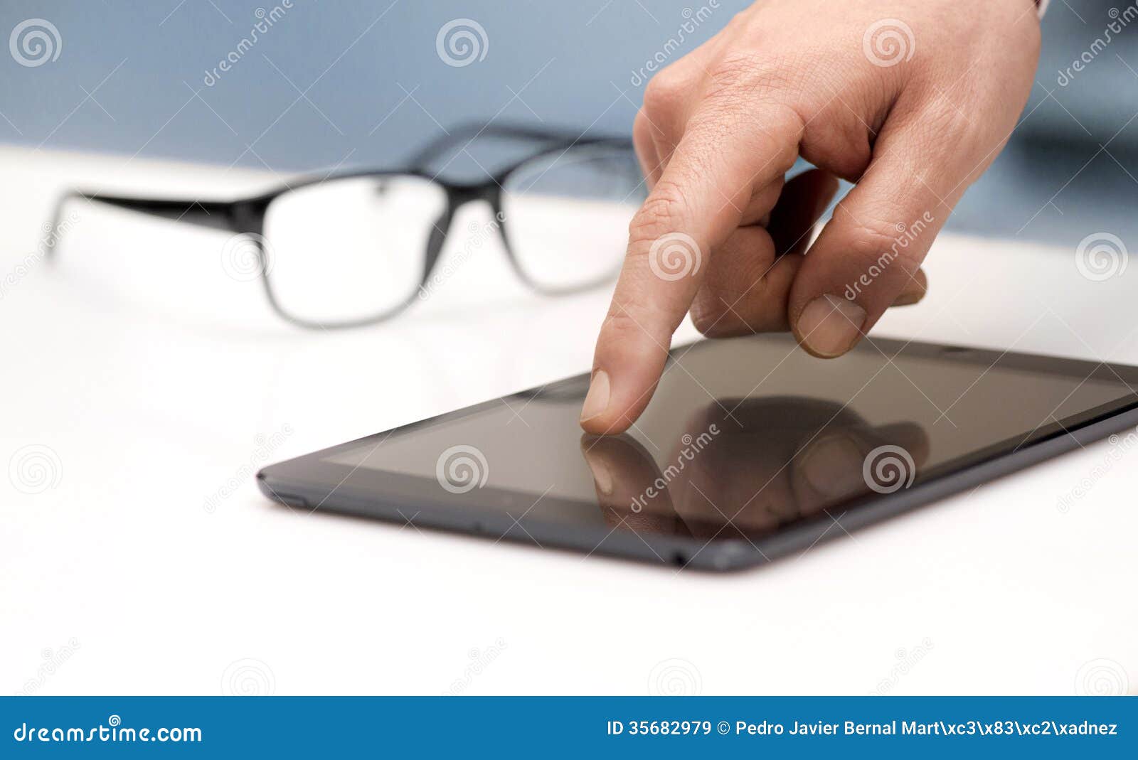 Finger touching a tablet stock image. Image of mini, fingerprint - 35682979