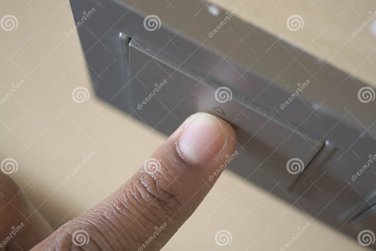 A Finger Turning on Lighting Switch . Stock Photo - Image of indoors ...
