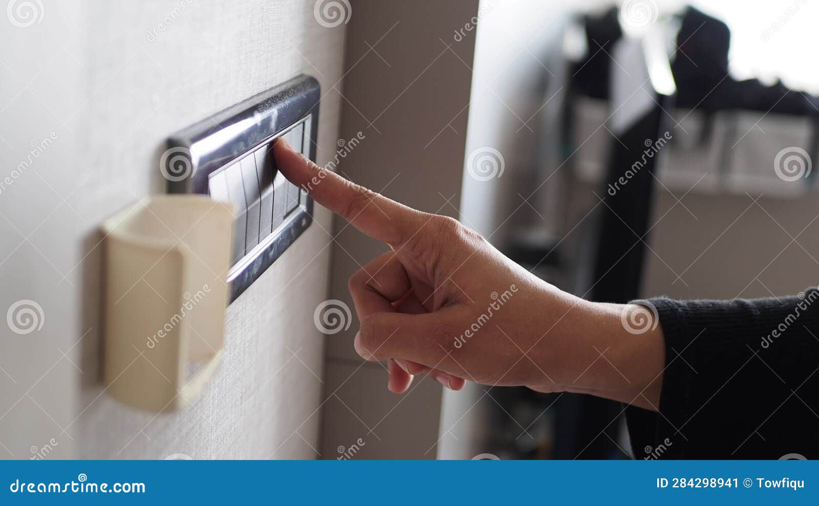 A Finger Turning on Lighting Switch . Stock Video - Video of room ...