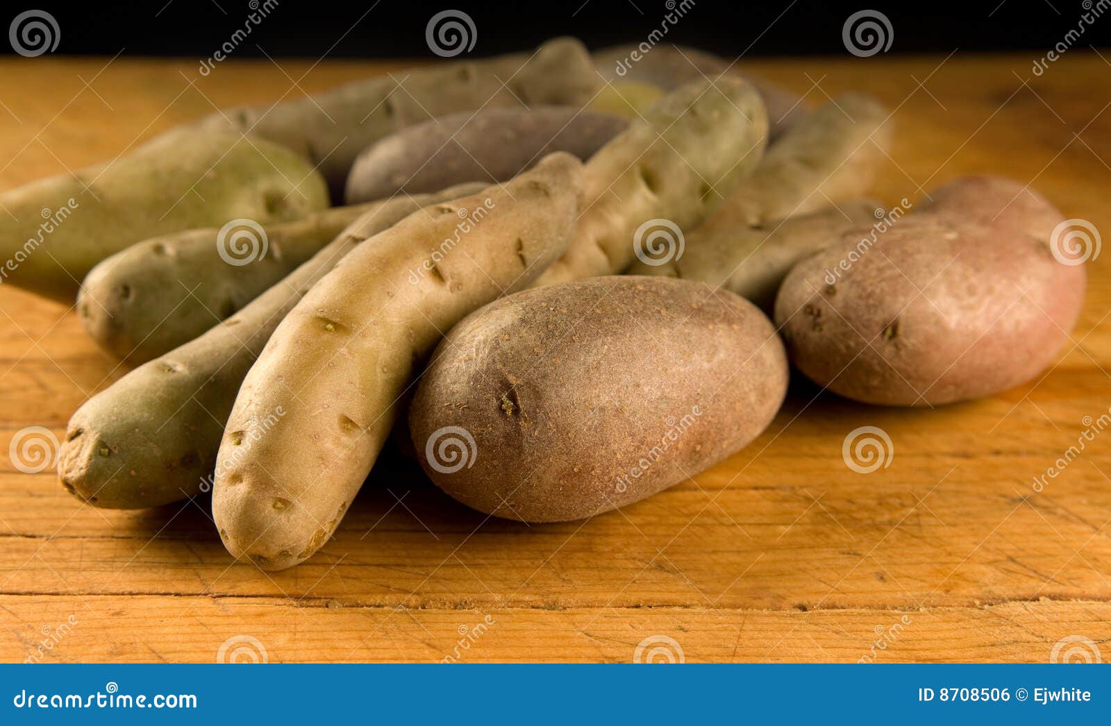 Fingerling potatoes stock photo. Image of board, potatoes - 8708506