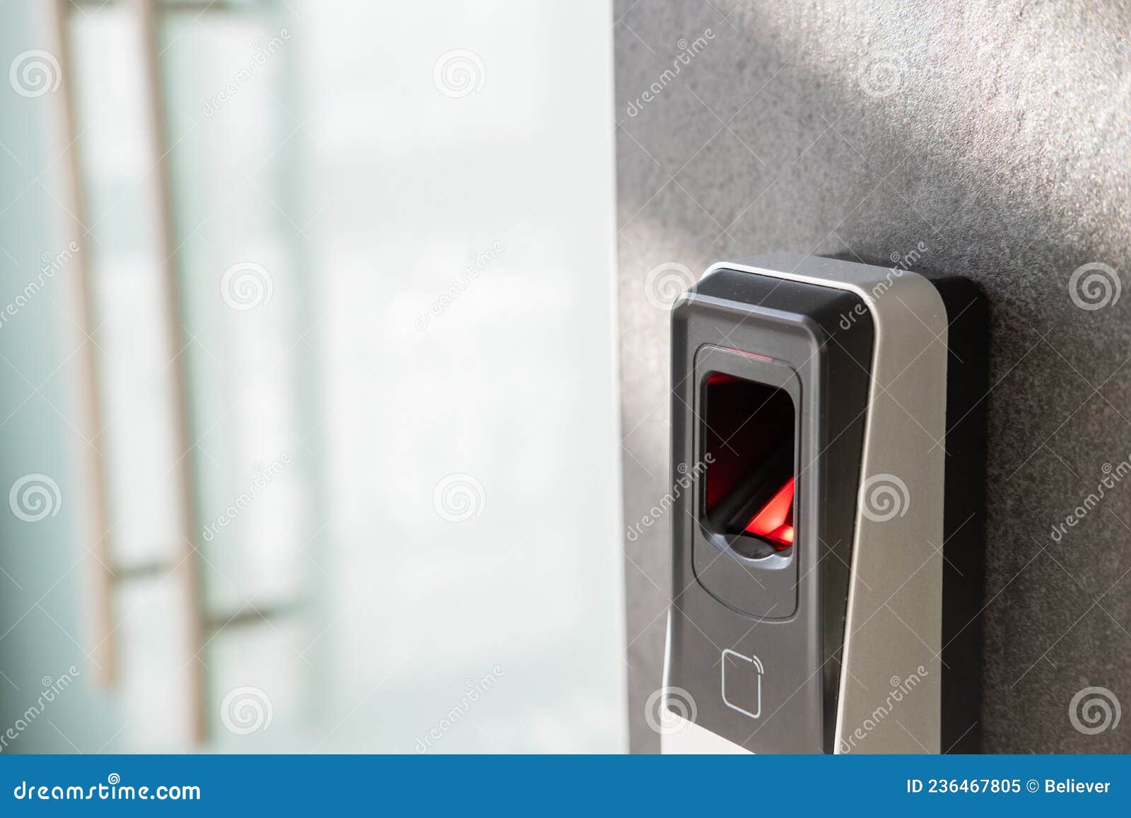 Fingerprint Scanner on the Wall in the Office Space. Modern Technology ...