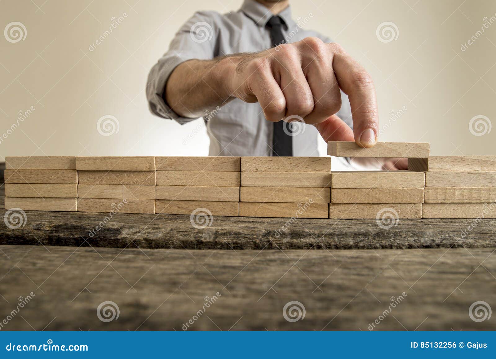 Fingers Placing Wooden Block on Orderly Stack Stock Photo - Image of ...