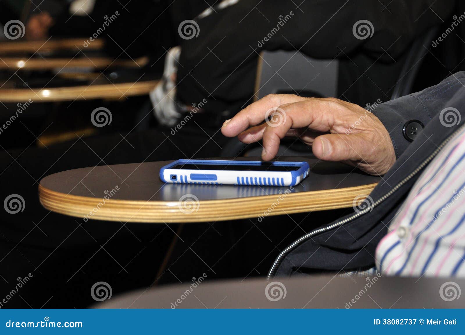 Fingers on smart-phone stock image. Image of armrest - 38082737