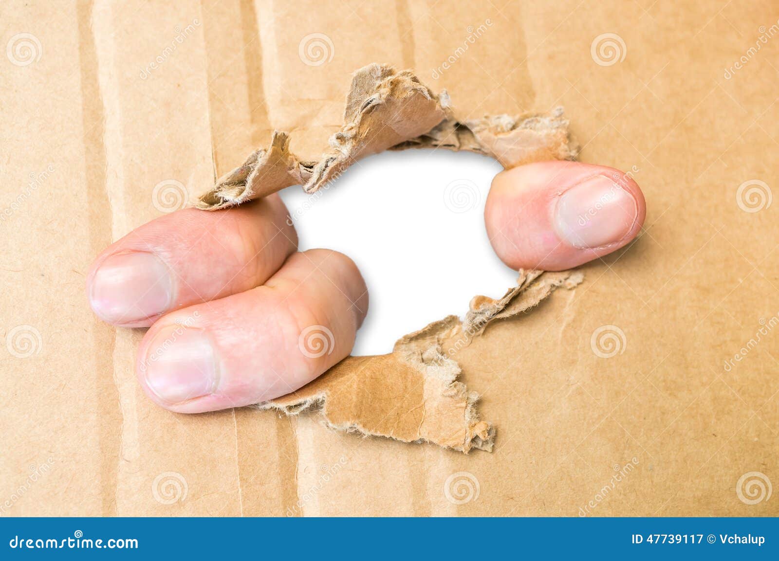 Fingers Tear Hole in Cardboard Paper Stock Image - Image of hole, tear ...