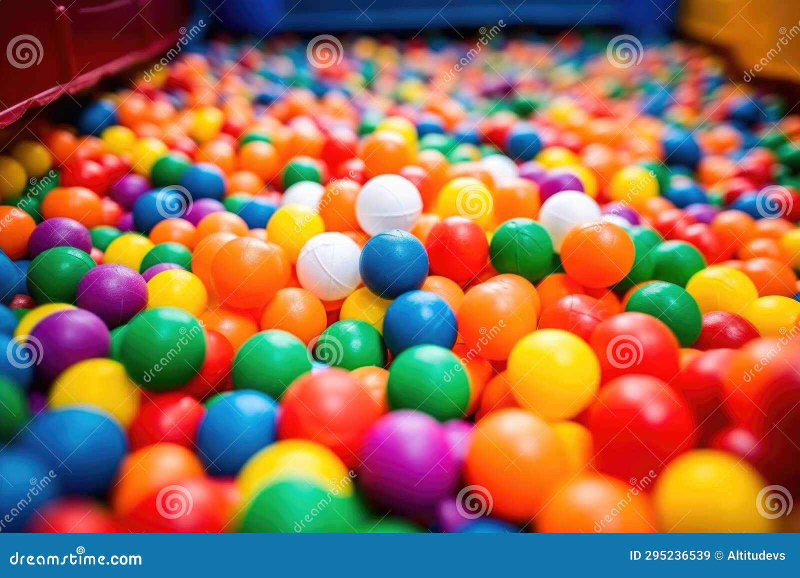 A Finished Colorful Bouncing Ball Amidst Raw Rubber Pieces Stock Image ...