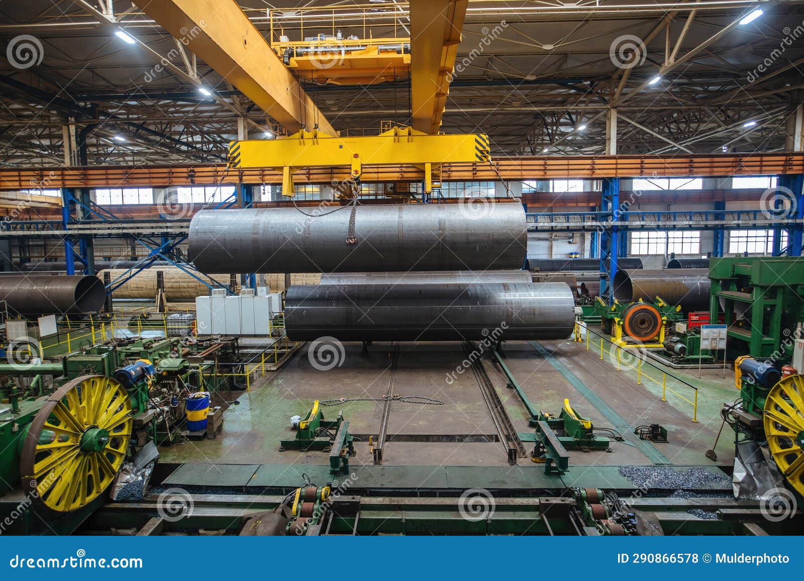 Finished Pipe Transportation by Overhead Crane in Pipe Factory Stock ...