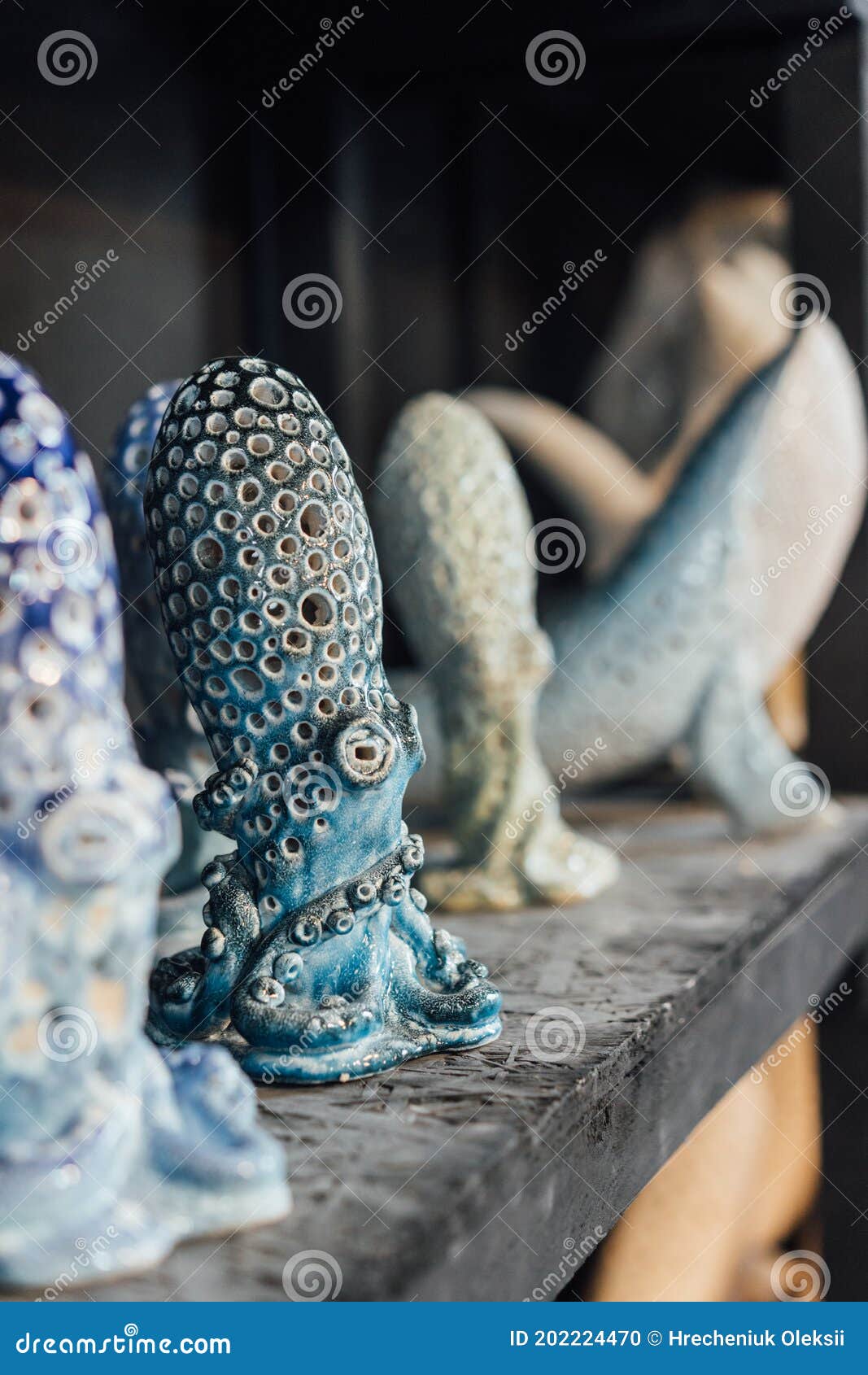 Finished Pottery Stands on a Shelf in a Pottery Workshop Stock Photo ...