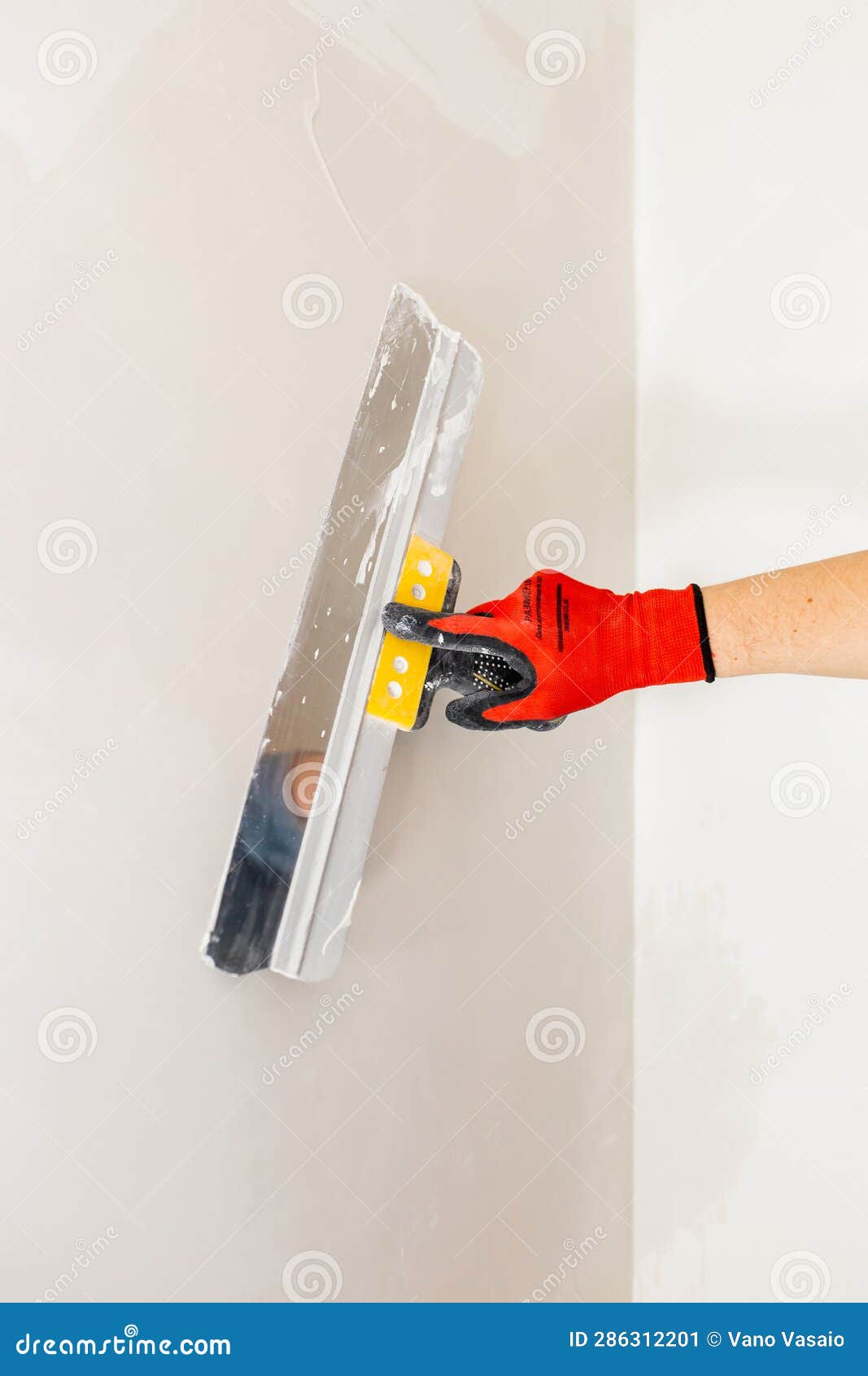 The Finisher Makes the Surface of the Wall Even and Smooth Stock Image ...