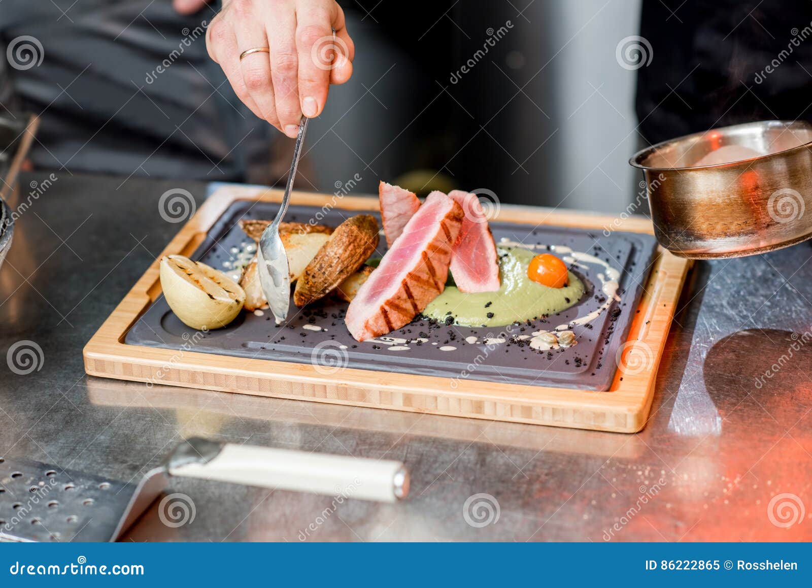 Finishing delicious dish stock image. Image of hands - 86222865