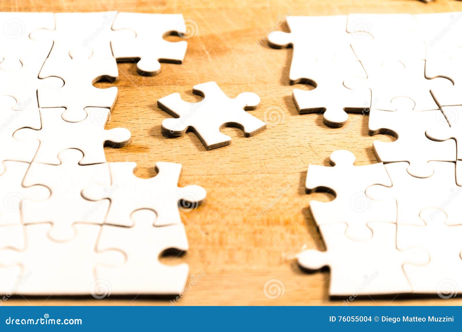 Finishing the puzzle stock photo. Image of solving, solution - 76055004
