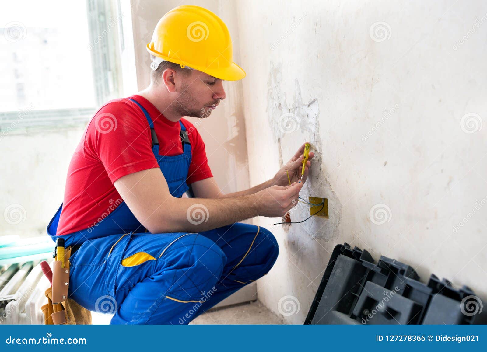 Finishing Touches on a Wall Socket Spot Stock Photo - Image of engineer ...