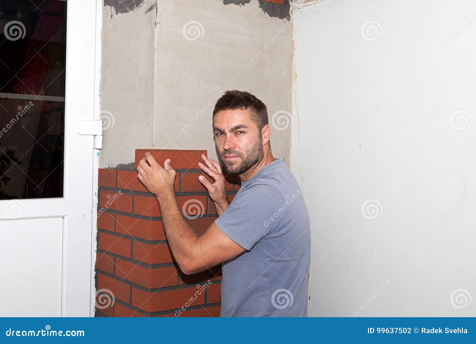 Worker Stuck Stone Cladding On The Facade. Stock Image | CartoonDealer ...