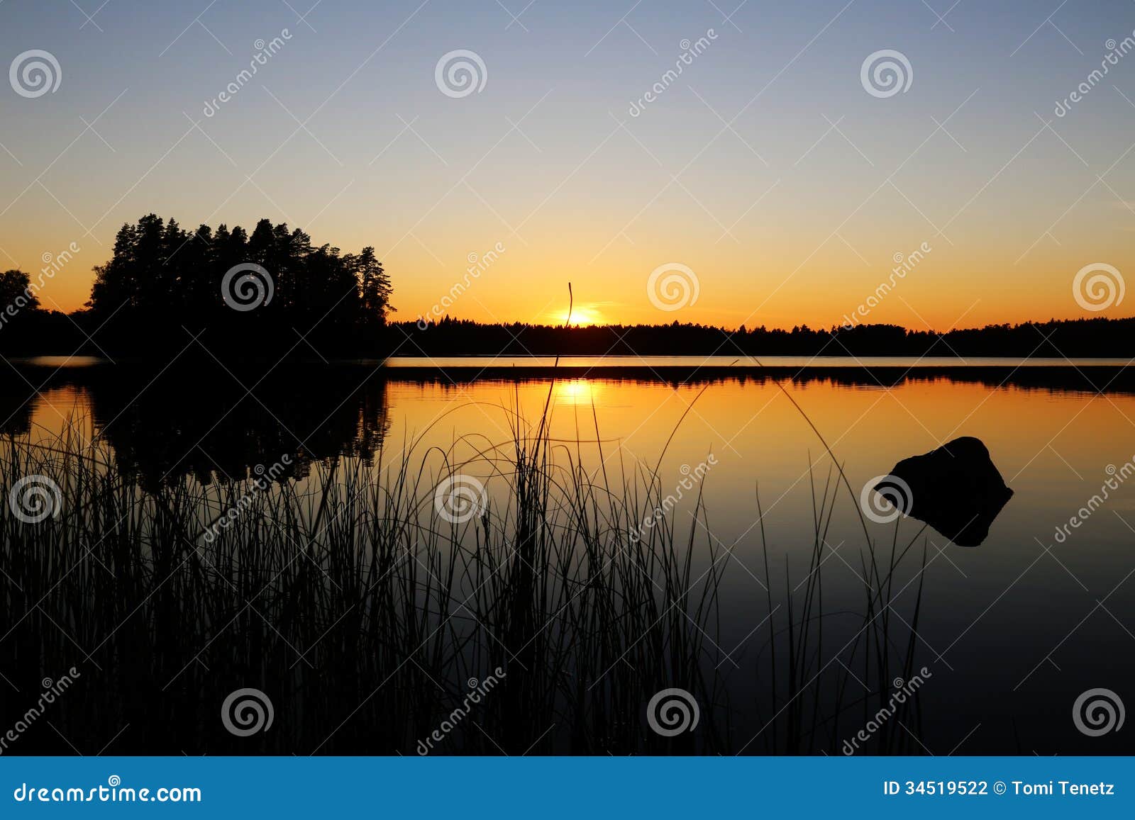 Finland: Sunset by a lake stock photo. Image of outdoors - 34519522