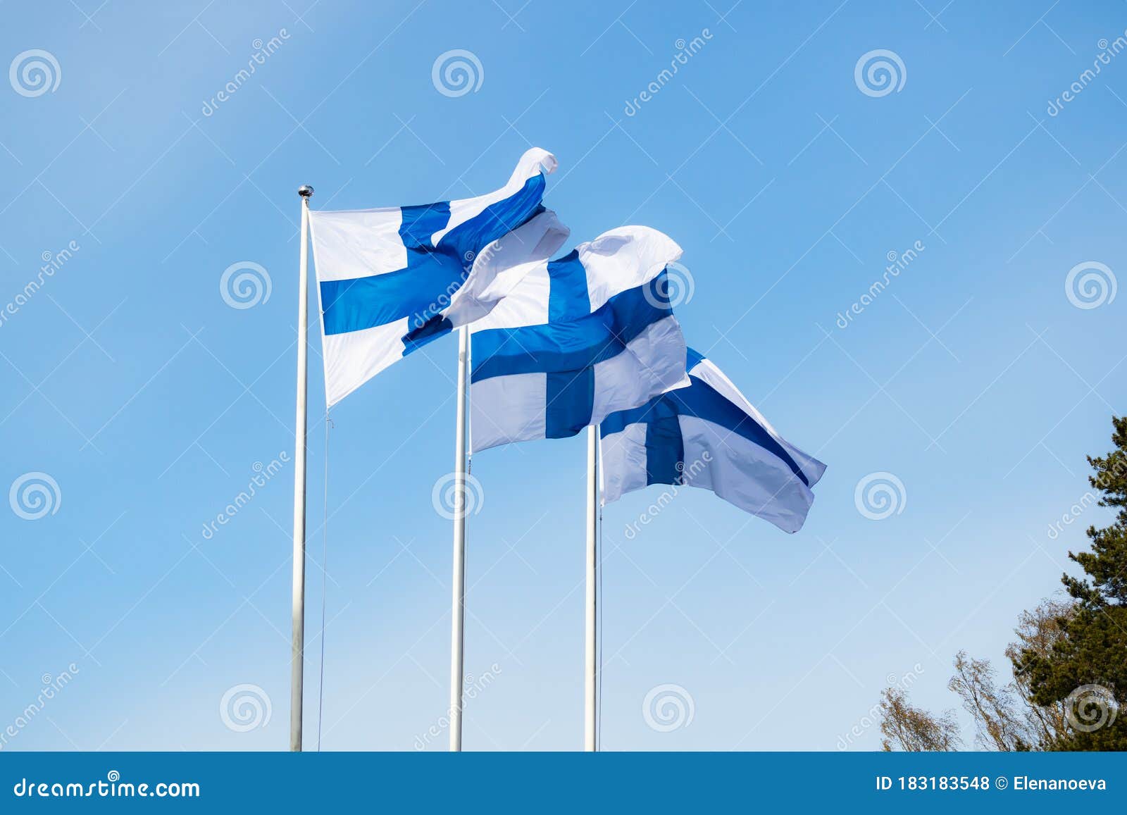 Finnish National Flag on the Wind Against the Blue Sky Stock Photo ...