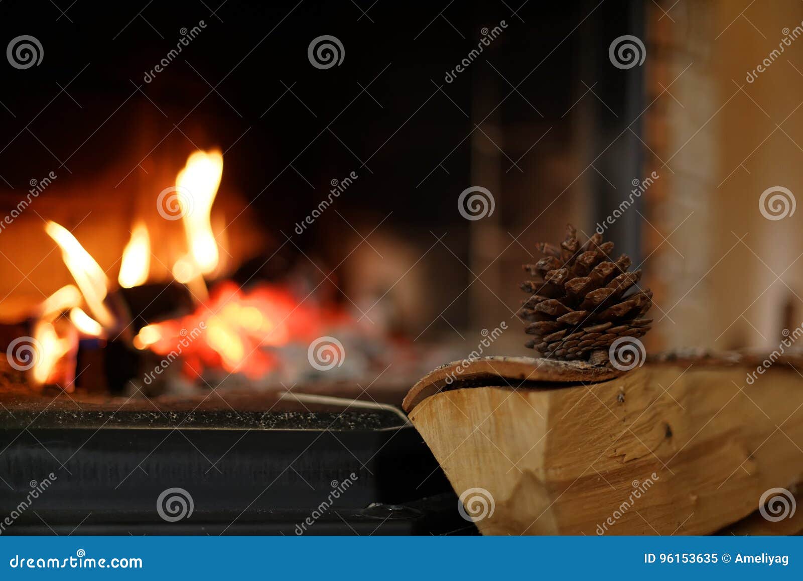 Fir cone at the fire place stock image. Image of firewood - 96153635