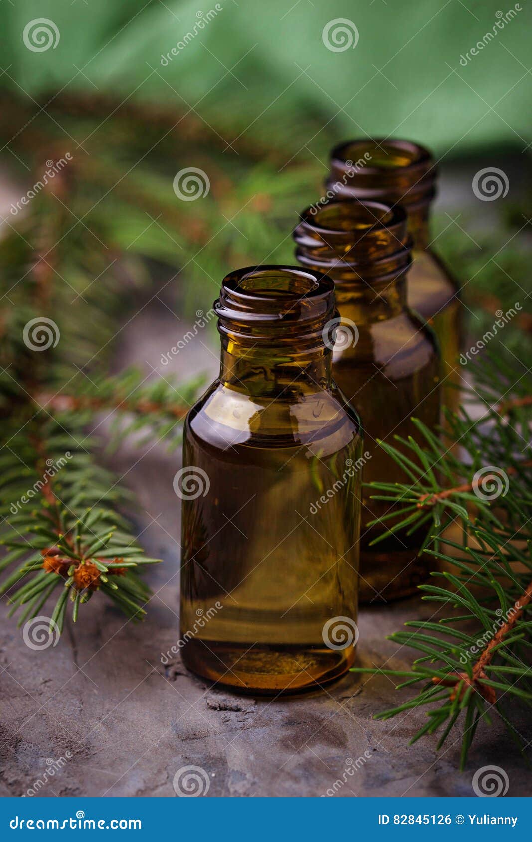 Fir Tree Essential Oil in Small Bottles Stock Photo - Image of wellness ...