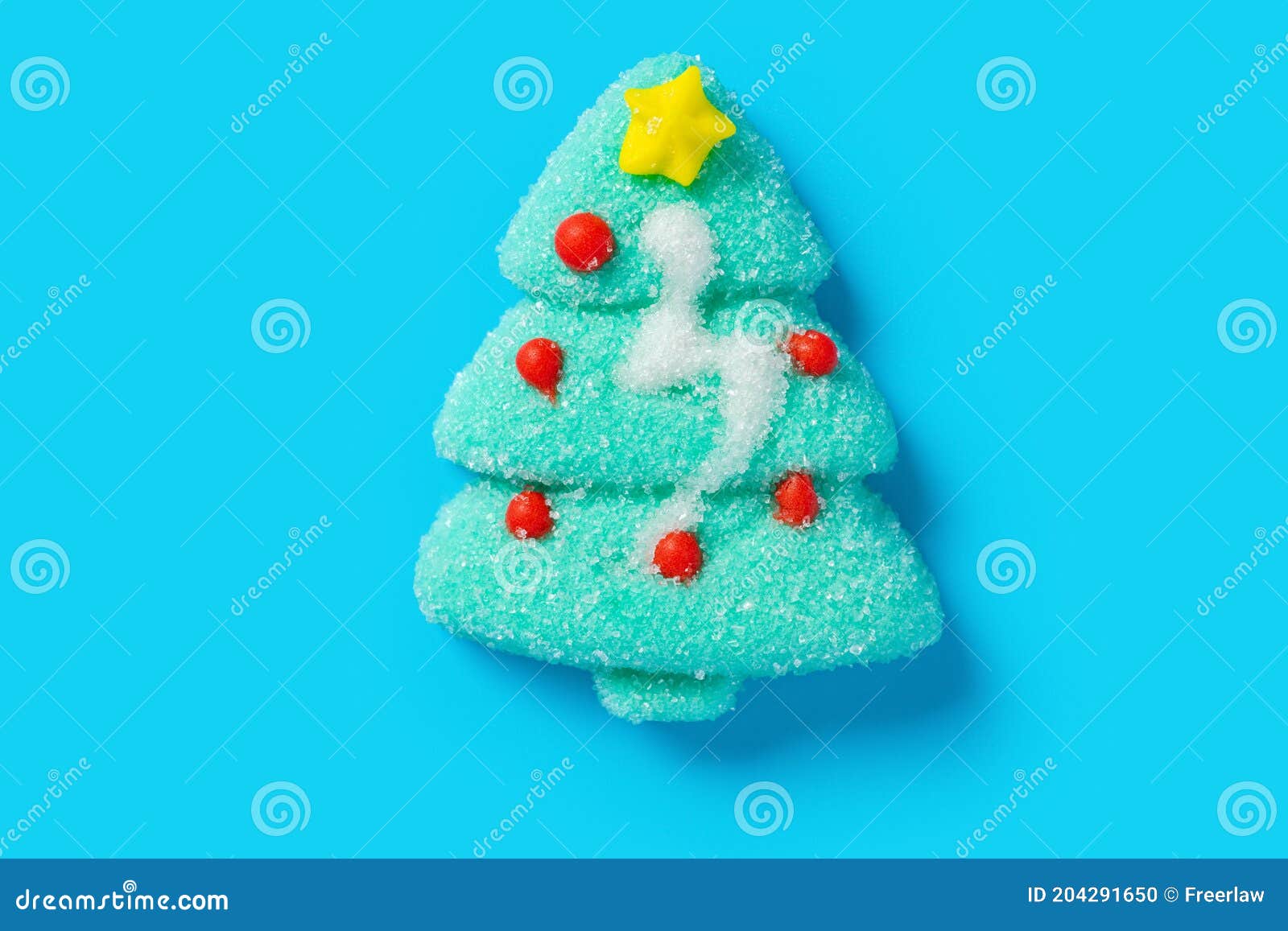 A Fir-tree Shape Candy on a Blue Background Stock Photo - Image of ...
