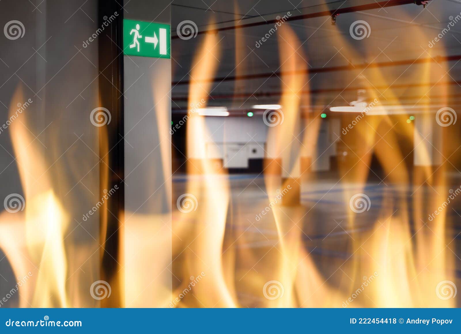 Fire Against Emergency Exit Sign Stock Photo - Image of danger ...