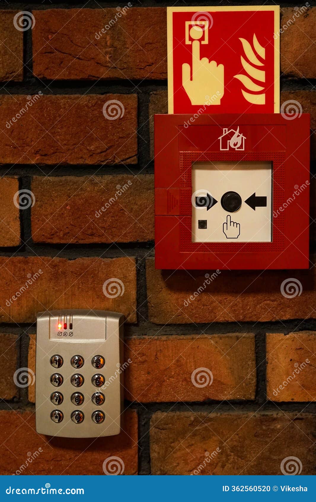 Fire Alarm and Security Keypad on a Brick Wall Stock Photo - Image of ...
