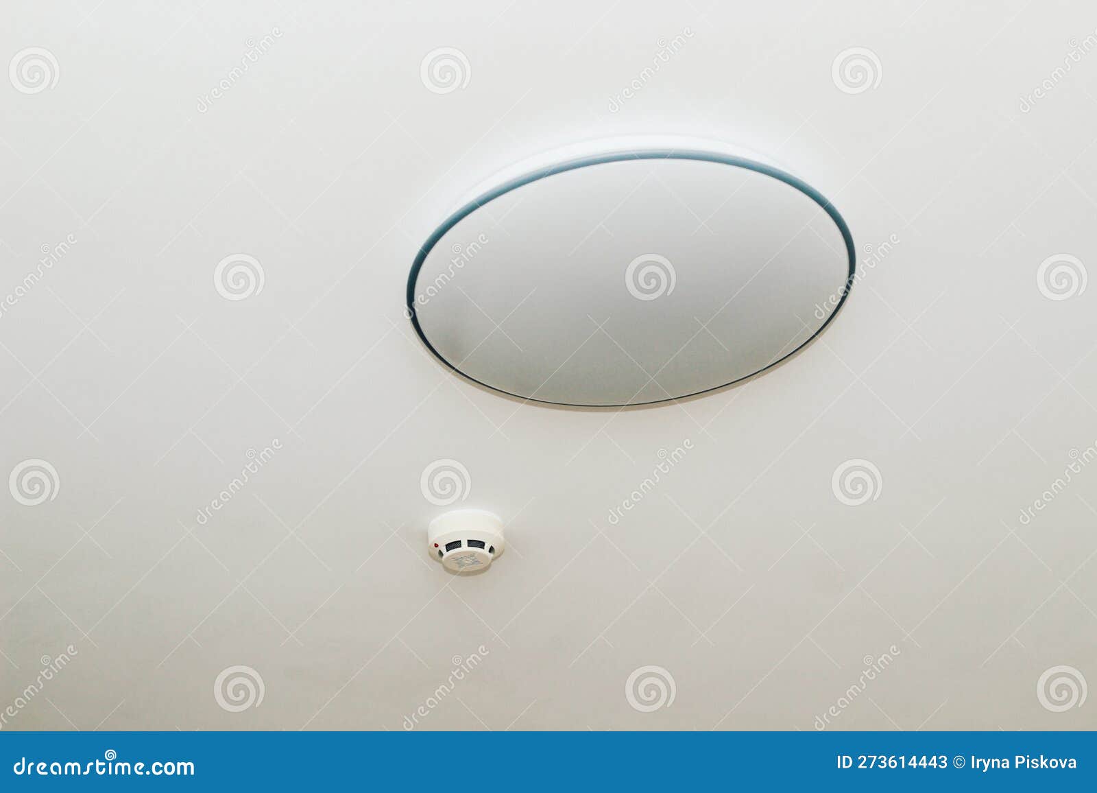 A Fire Alarm Sensor on the Ceiling with a Chandelier. Stock Image ...