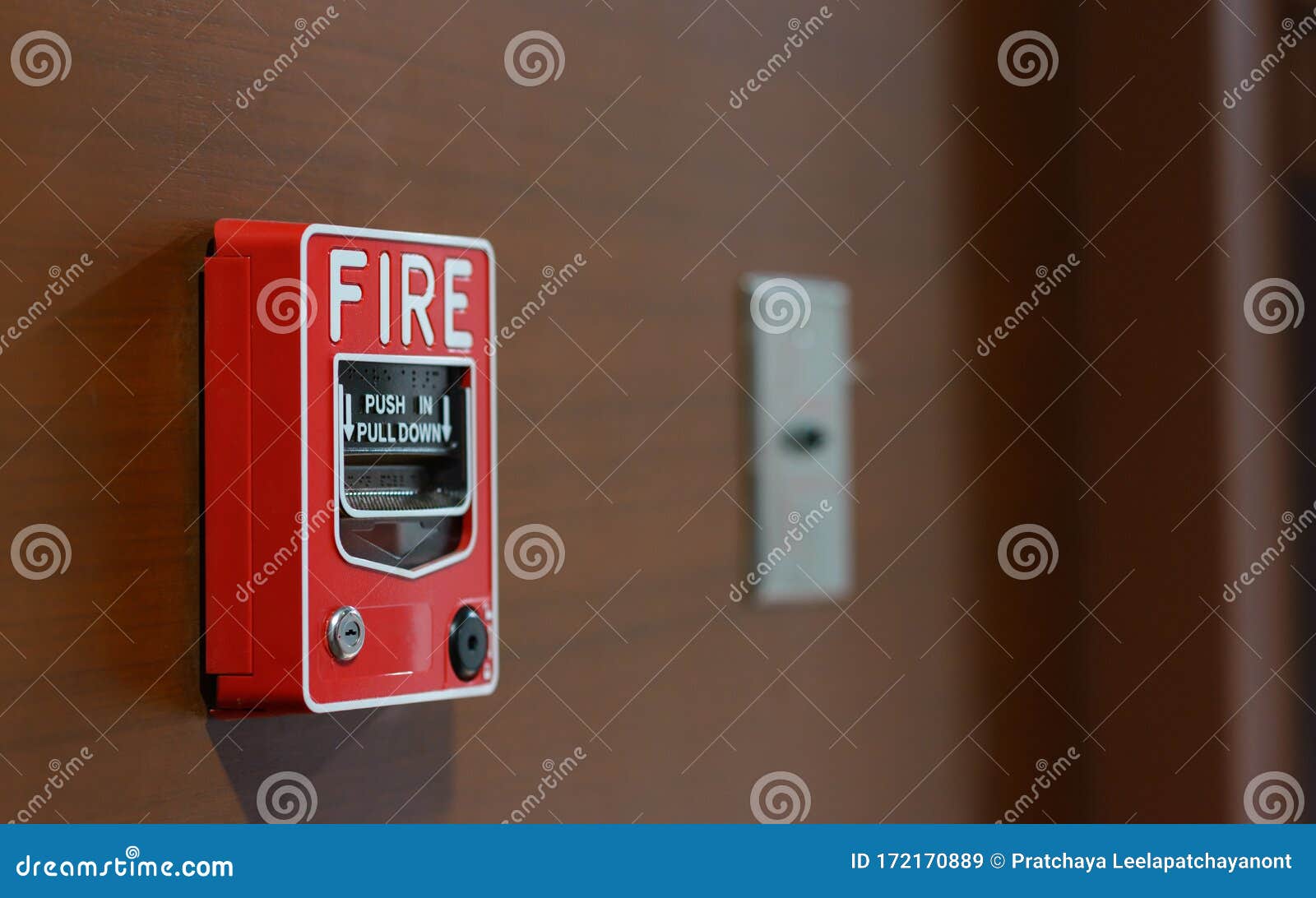 Fire Alarm Switch on Wooden Wall with Copy Space. Warning and Security ...