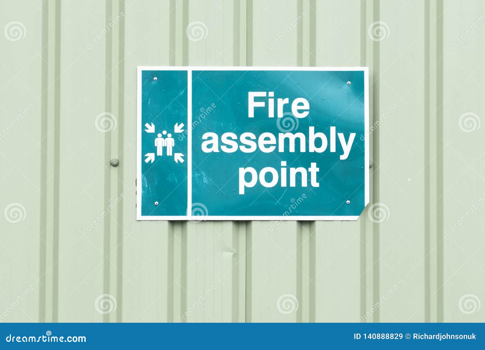 Fire Assembly Point Sign on Green Container Construction Site Stock ...