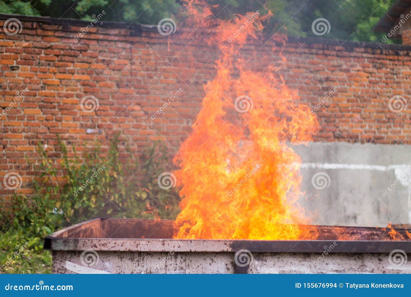 Fire on the Background of a Brick Wall Stock Photo - Image of backdrop ...