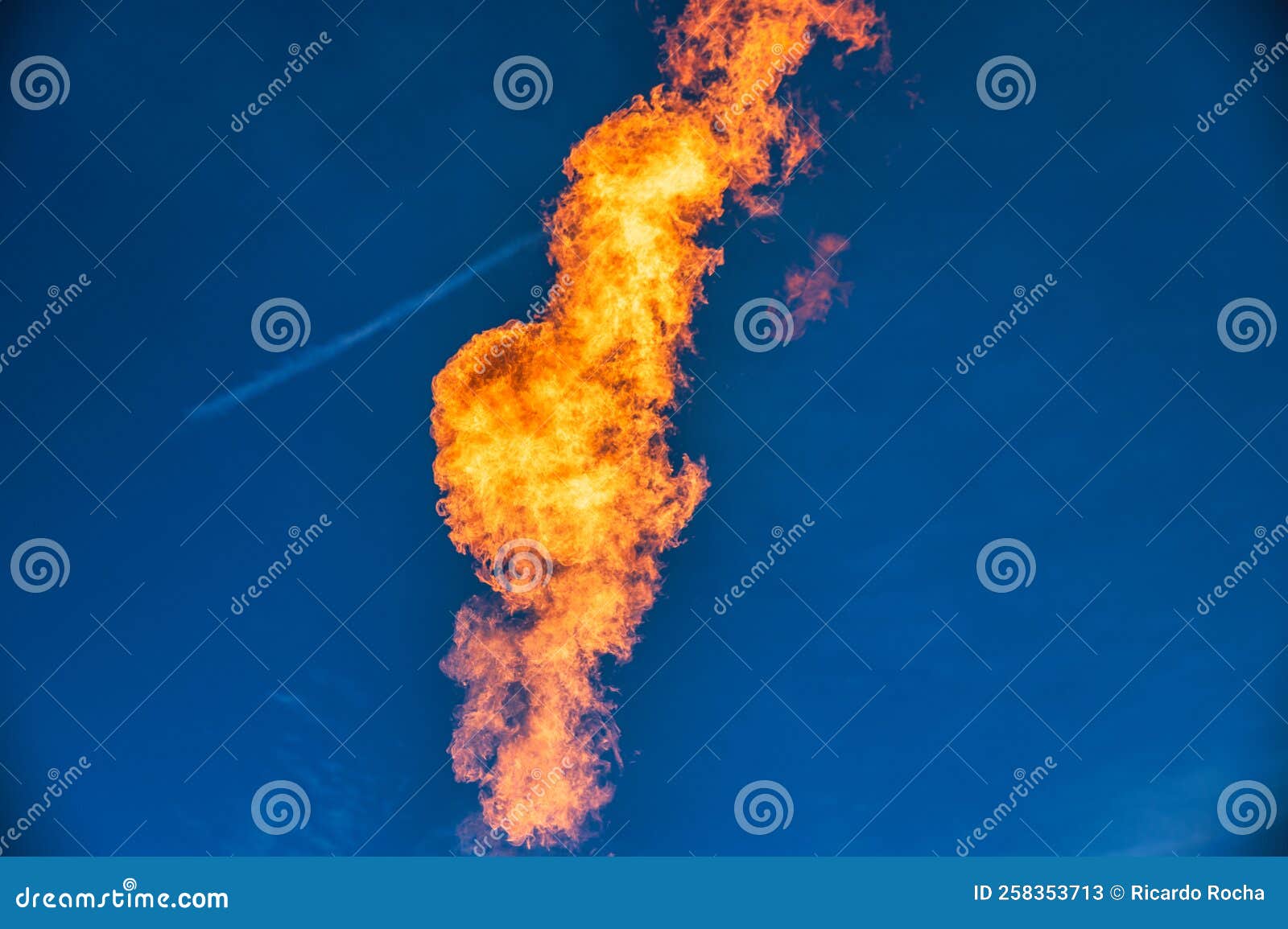 Fire ball agaisnt blue sky stock image. Image of flare - 258353713