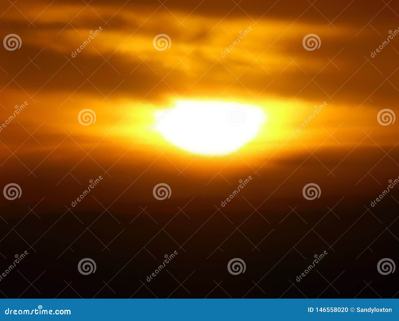 Fire ball sun at sunset stock photo. Image of tinted - 146558020