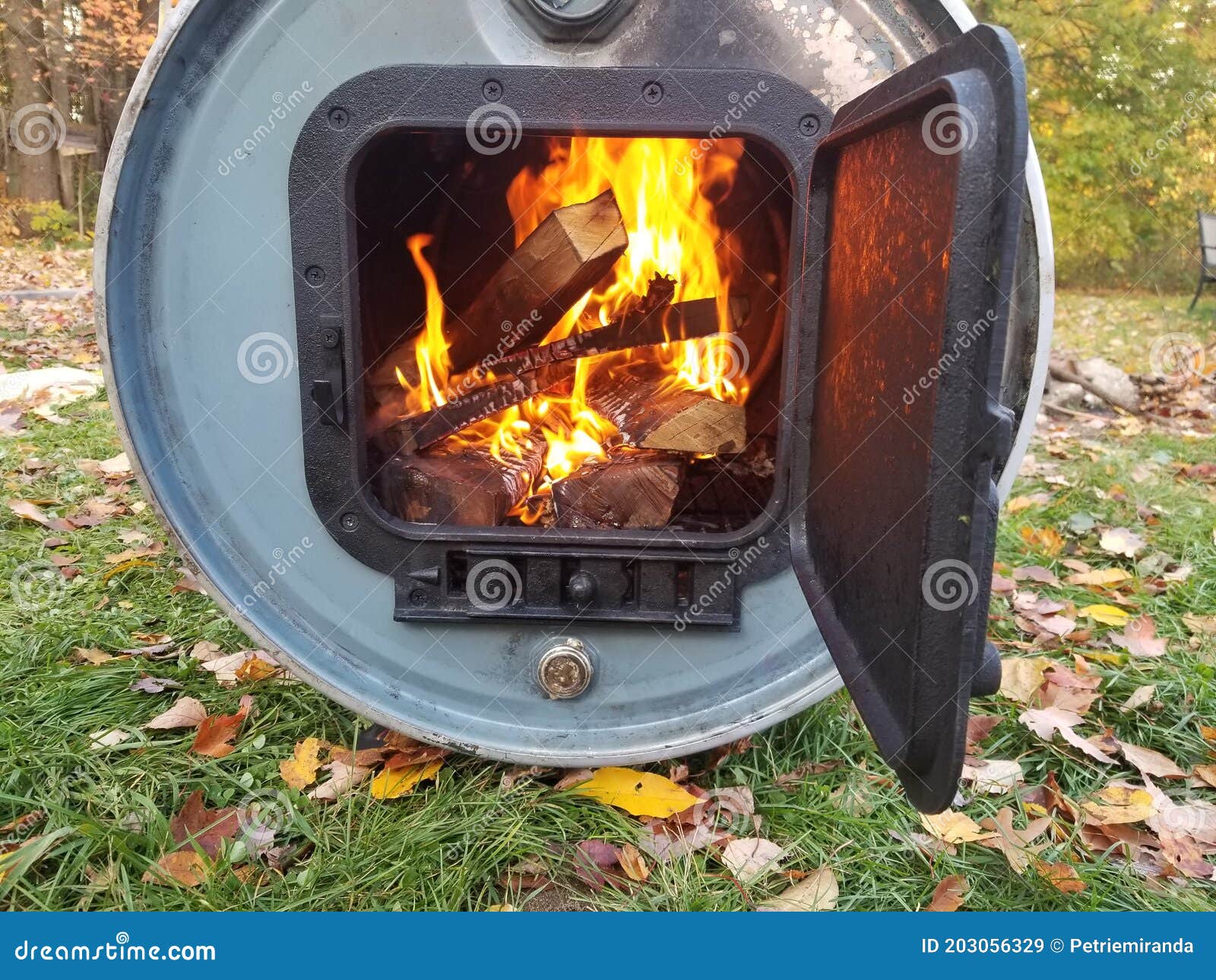 Fire in a barrel stock image. Image of flame, outdoors - 203056329
