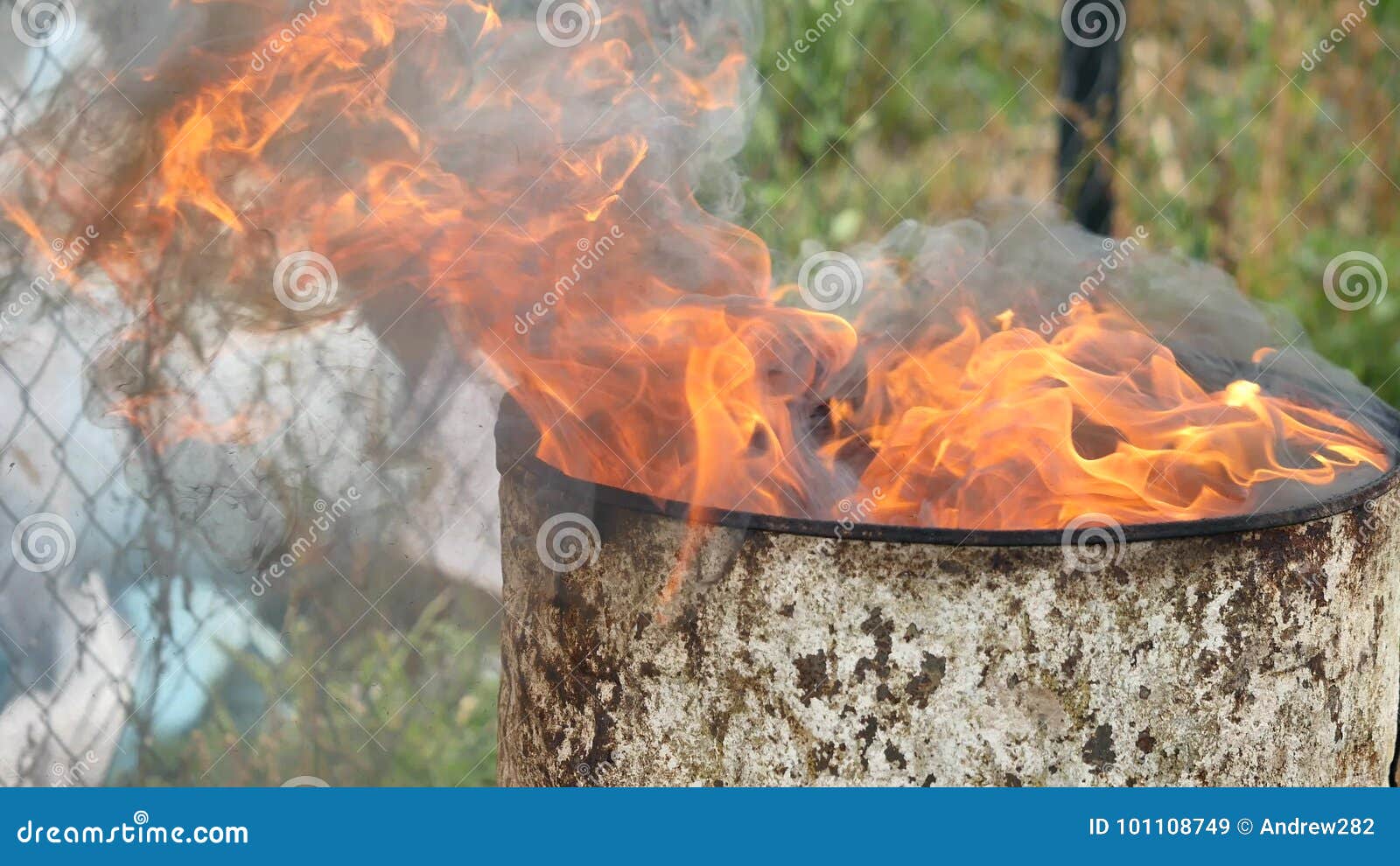 Fire in Barrels Oil Tank stock video. Video of burning - 101108749