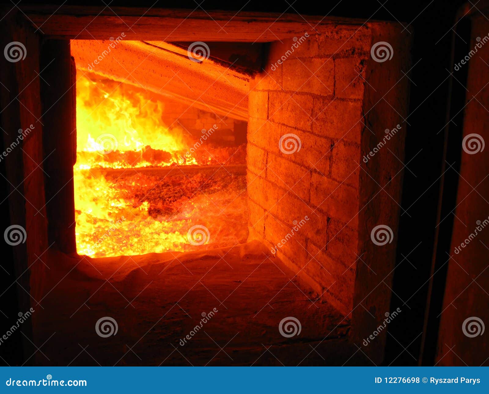 Fire in the boiler stock photo. Image of grate, orange - 12276698