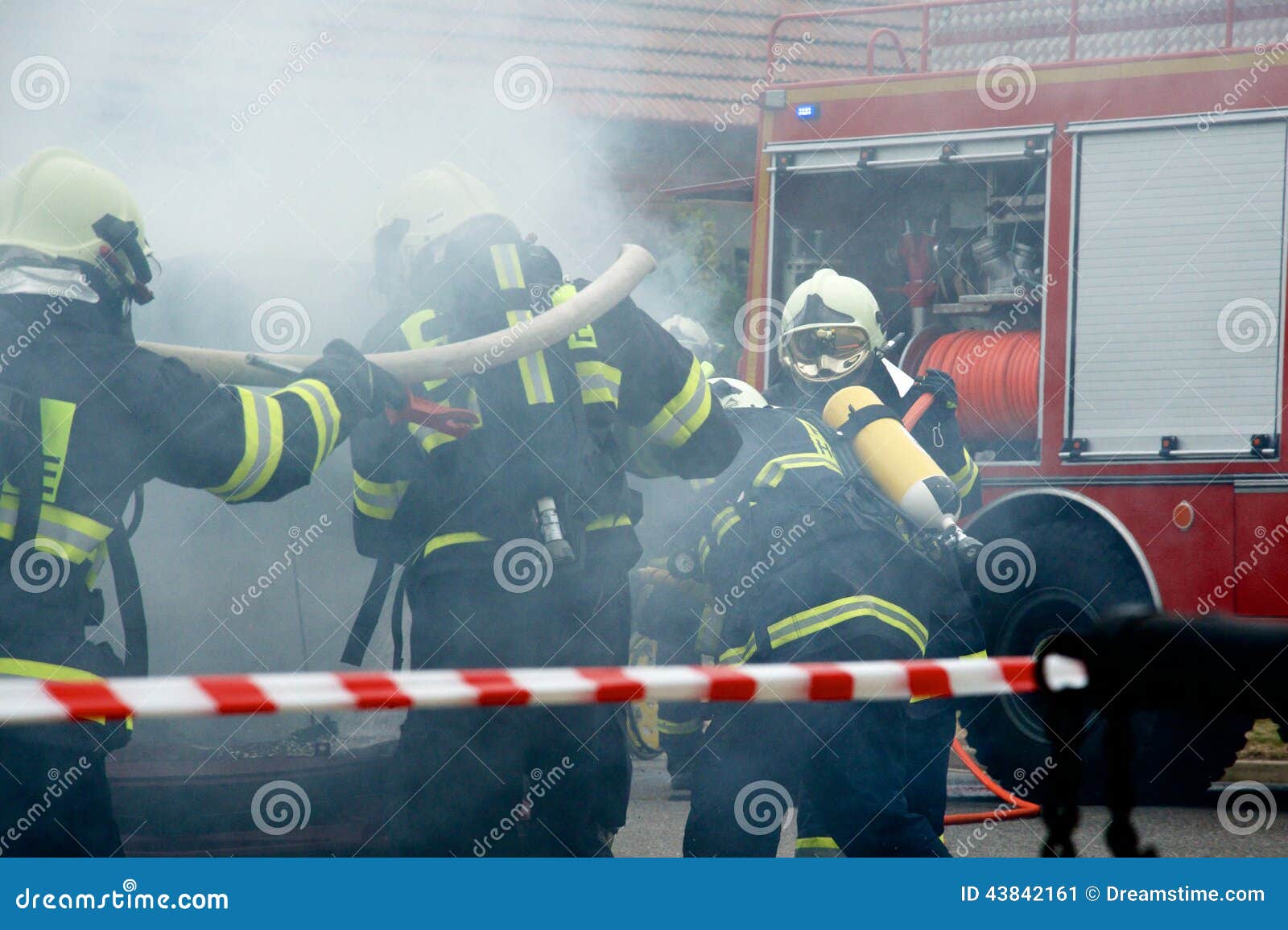 Fire brigade in action stock image. Image of tank, firetruck - 43842161