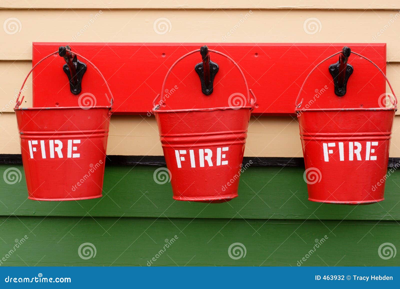 Fire Buckets Hanging on a Wall Stock Photo - Image of truck ...
