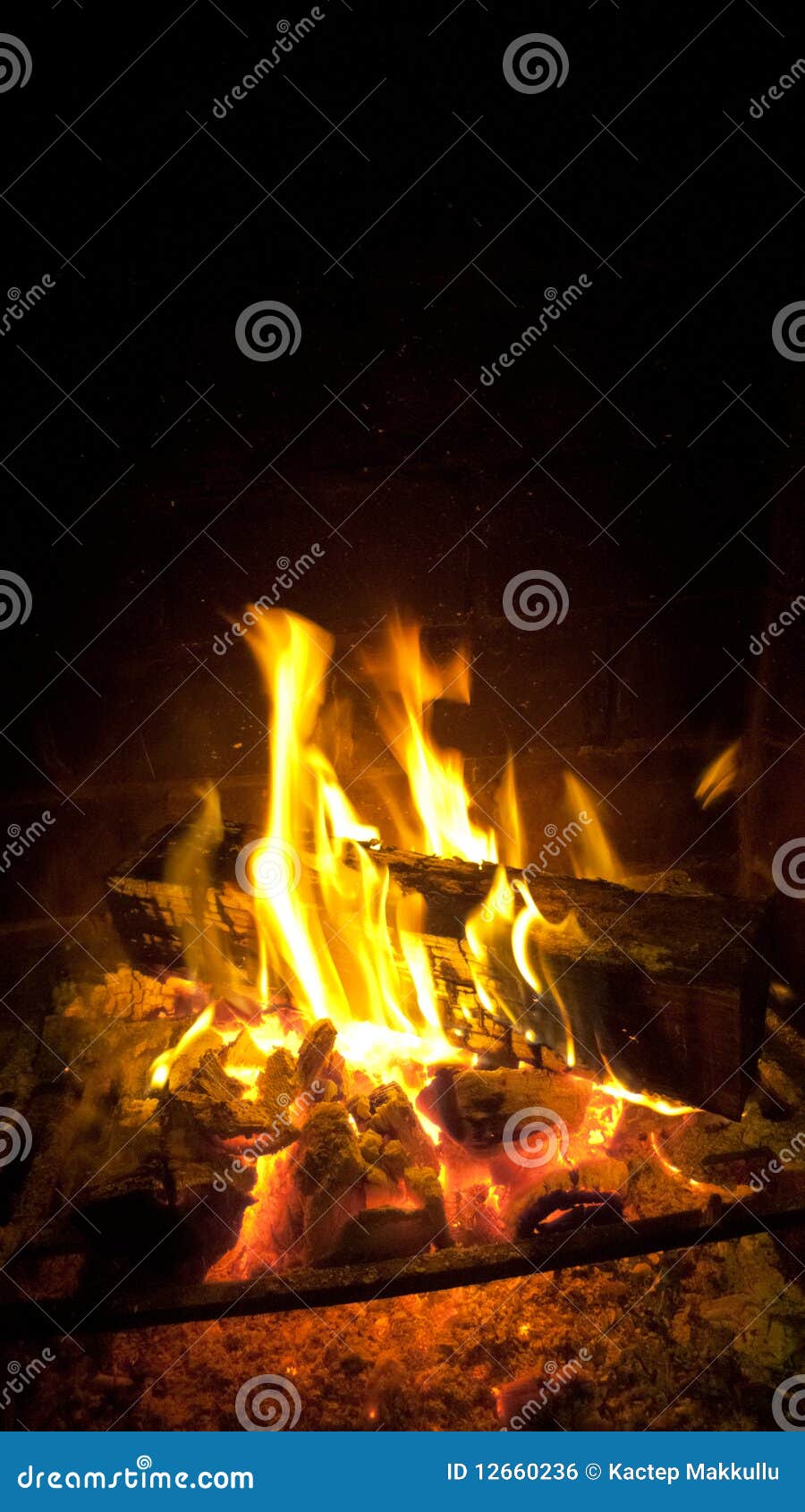 Fire Burning with Embers stock photo. Image of indoor - 12660236