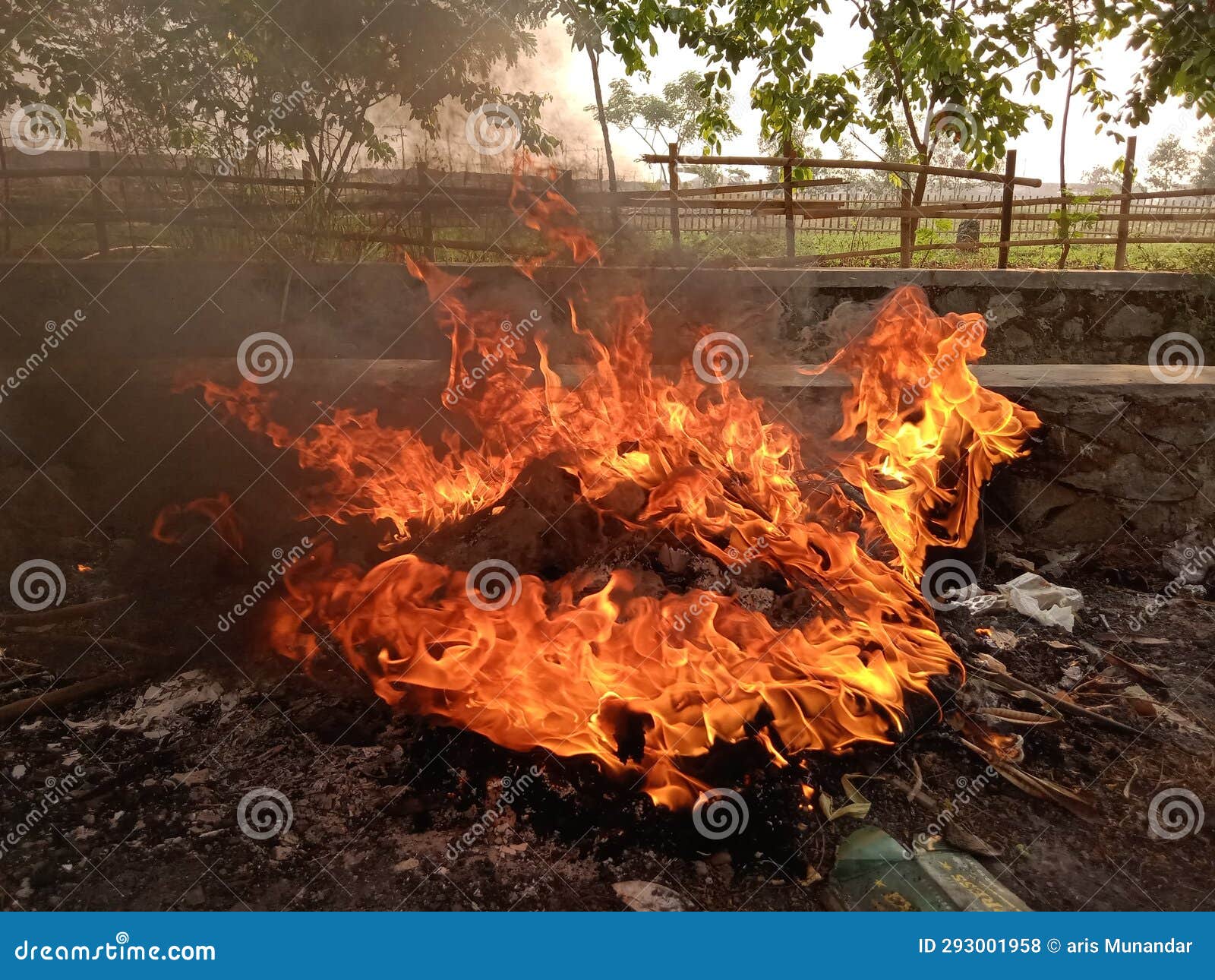 A Fire Burning on a Pile of Rubbish Stock Photo - Image of fire, smoke ...