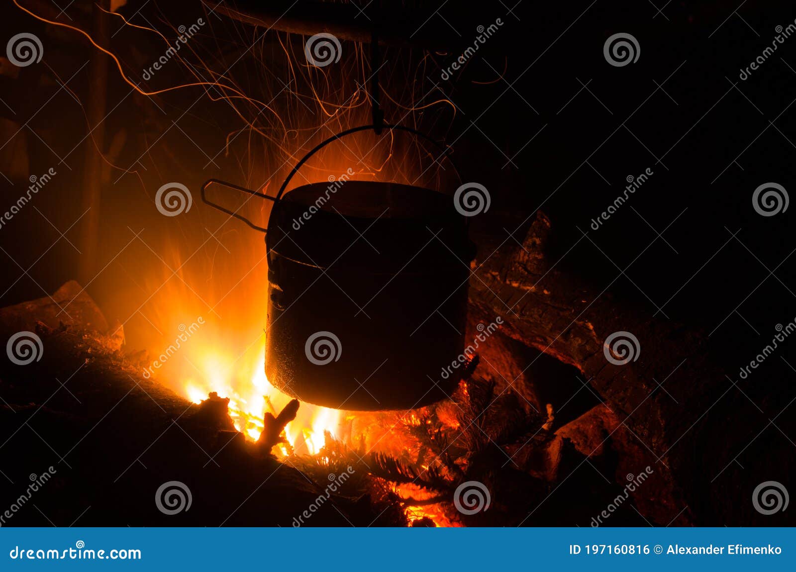 Fire Burns in the Campaign. Pot of Tea by the Fire Stock Photo - Image ...