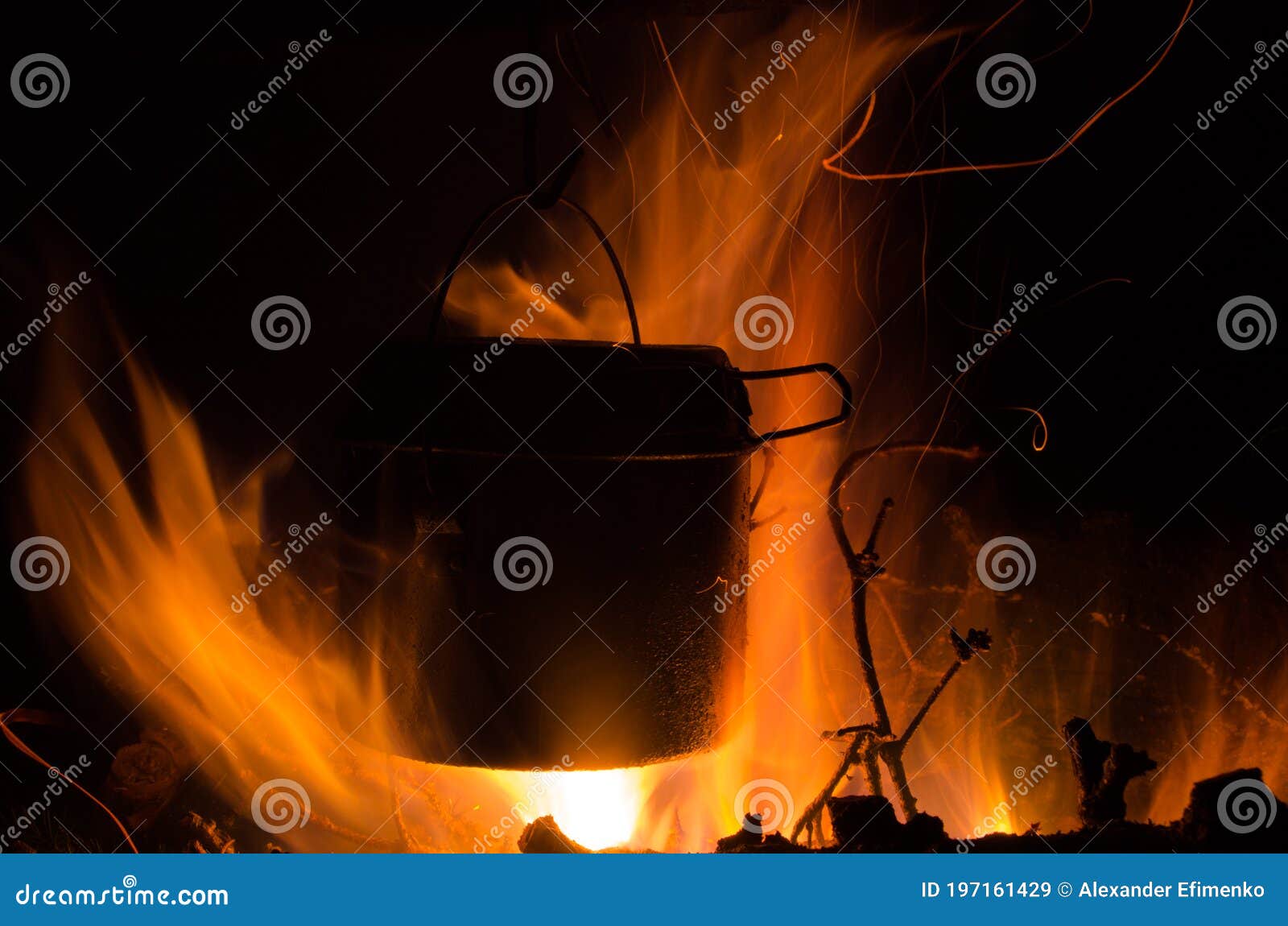 Fire Burns in the Campaign. Pot of Tea by the Fire Stock Image - Image ...