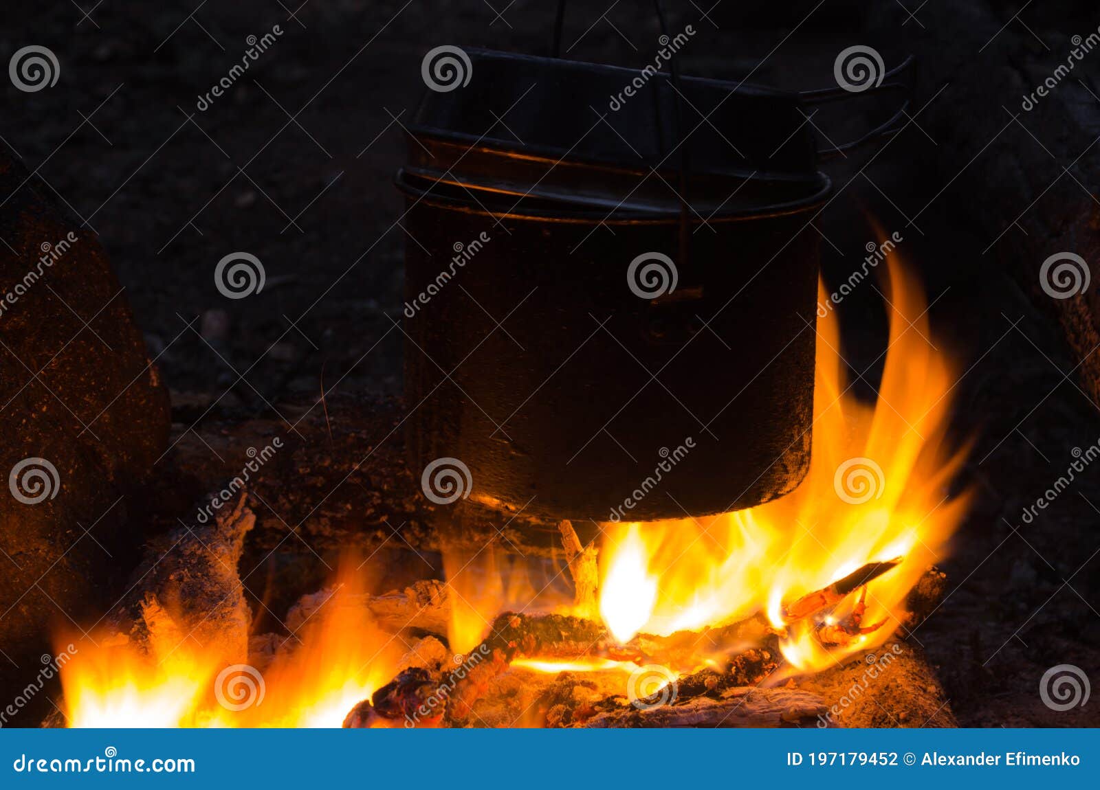 Fire Burns in the Campaign. Pot of Tea by the Fire Stock Photo - Image ...