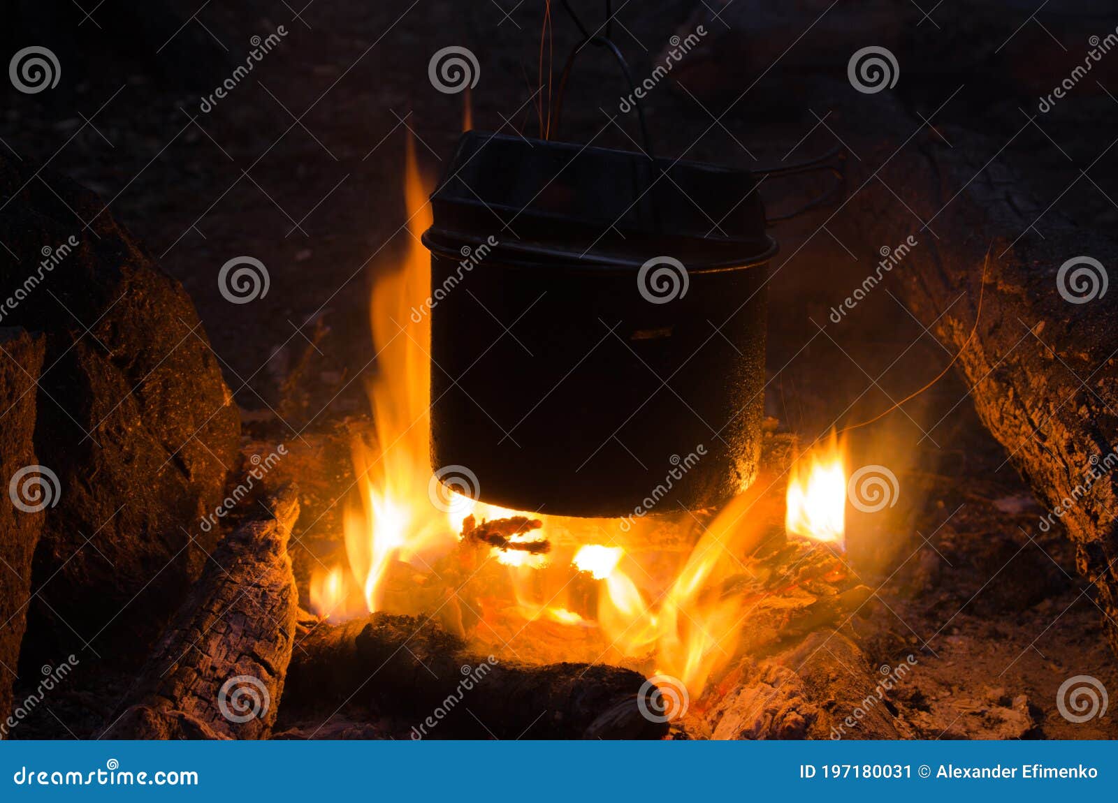 Fire Burns in the Campaign. Pot of Tea by the Fire Stock Image - Image ...