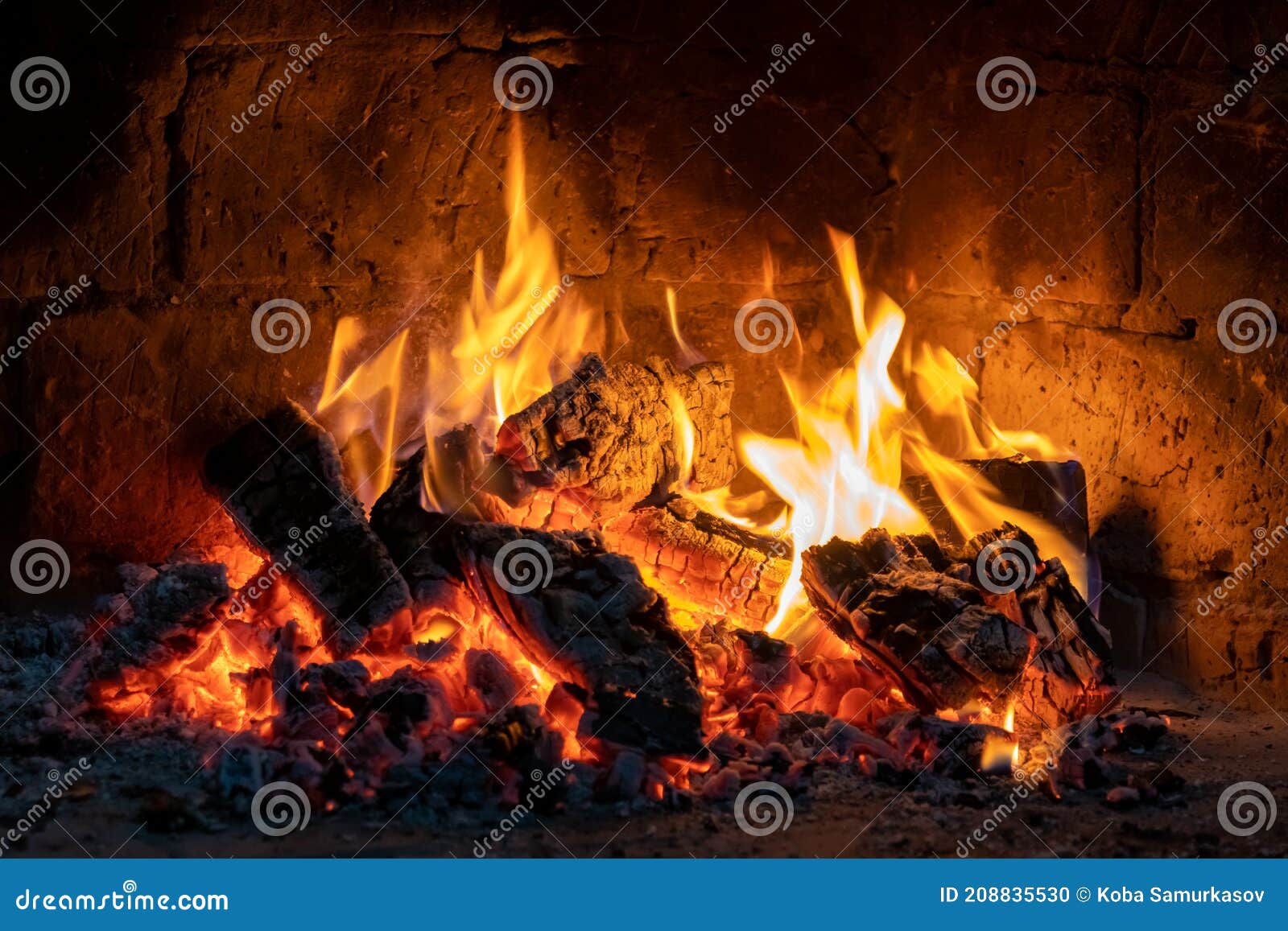 A Fire Burns in a Fireplace Fire To Keep Warm Stock Photo - Image of ...