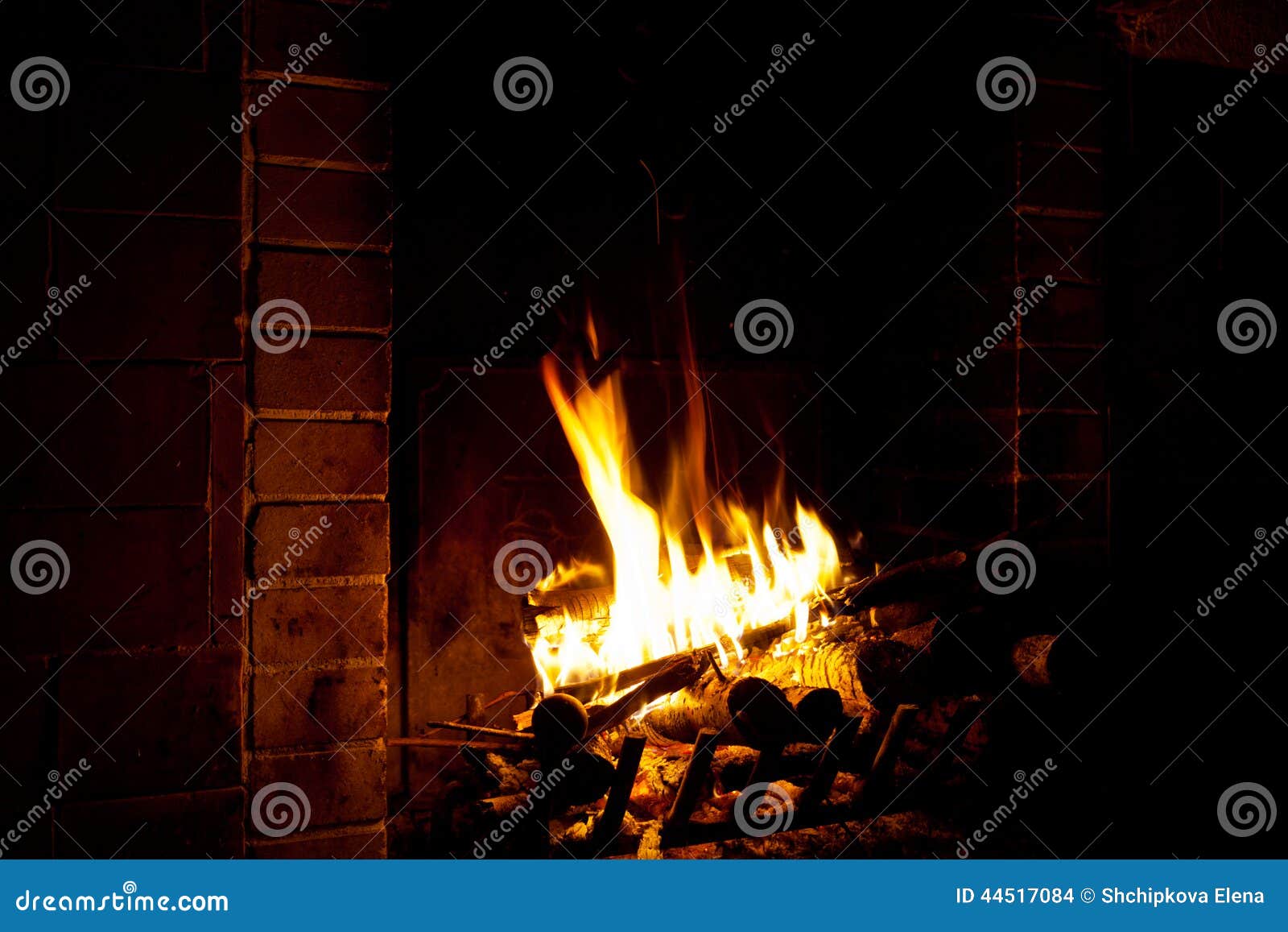 Fire burns in a fireplace stock photo. Image of burning - 44517084