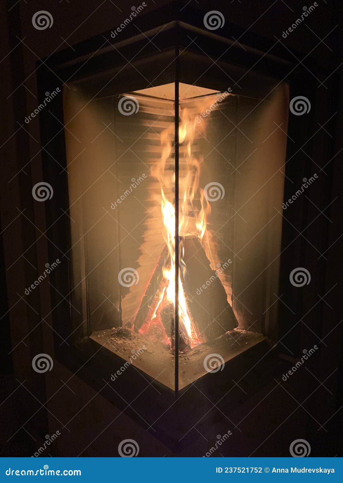 A Fire Burns in a Vertical Fireplace Stock Photo - Image of fireplace ...