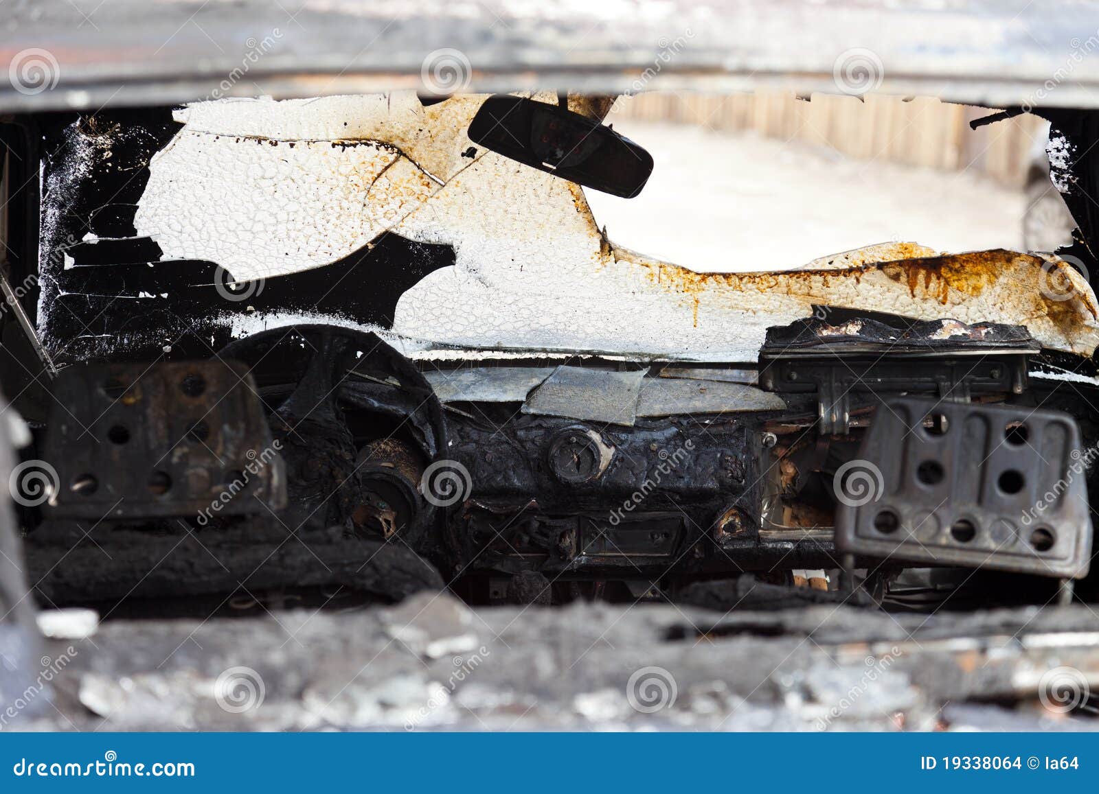 The Car After The Fire. Burnt Out Car With An Open Hood. Engine Burned ...